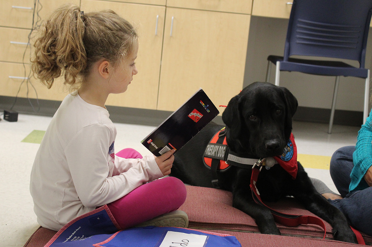 Student_Reads_to_Therapy_Dog_2 – Wynantskill Union Free School District